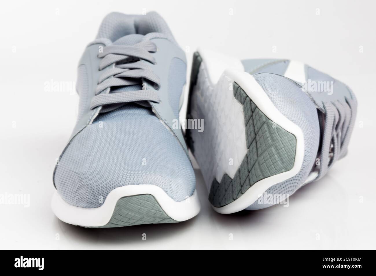 Grey running trainers hi-res stock photography and images - Alamy