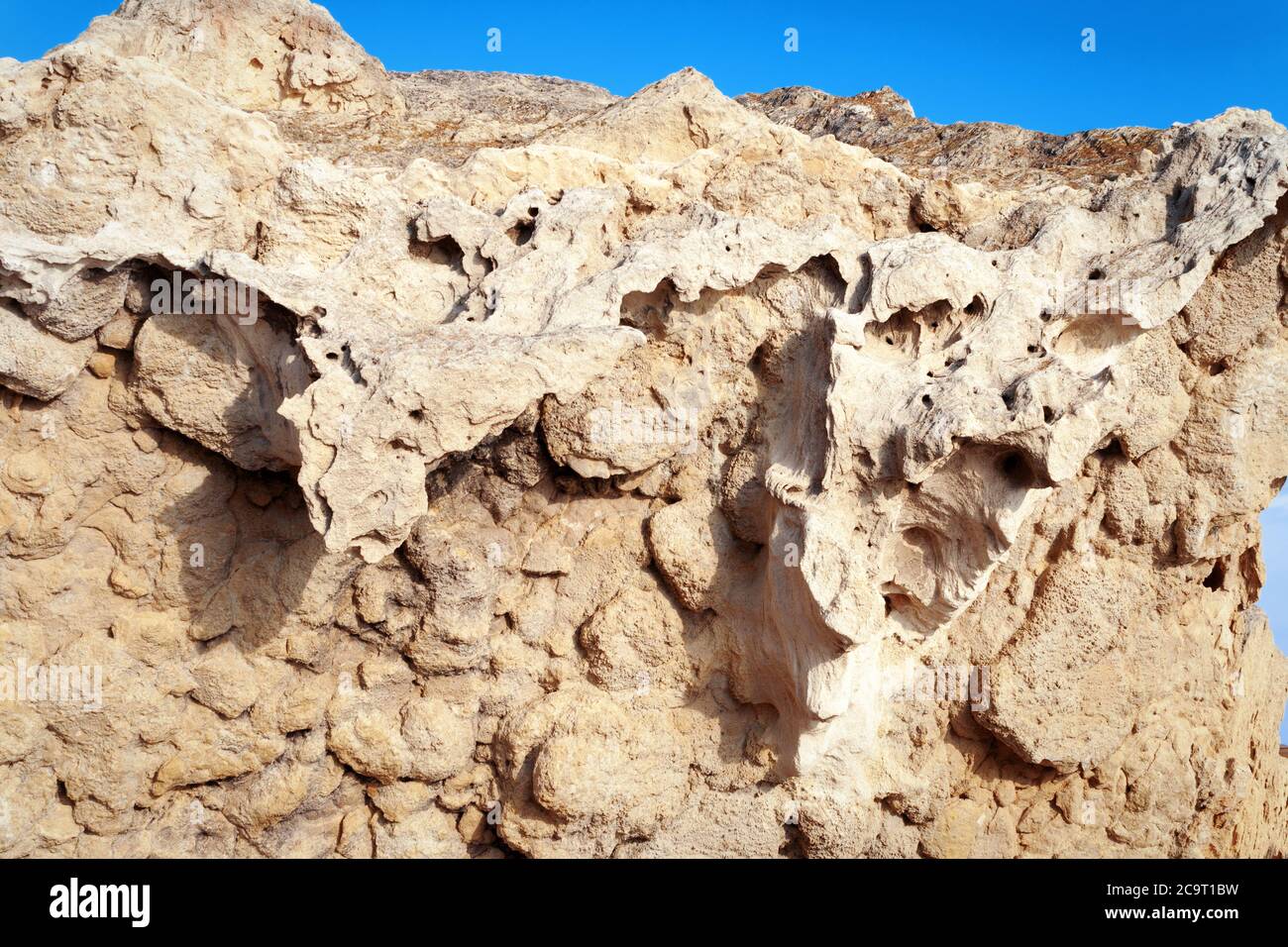 Surface sandy rock. Rocky shore of the Caspian Sea Stock Photo - Alamy