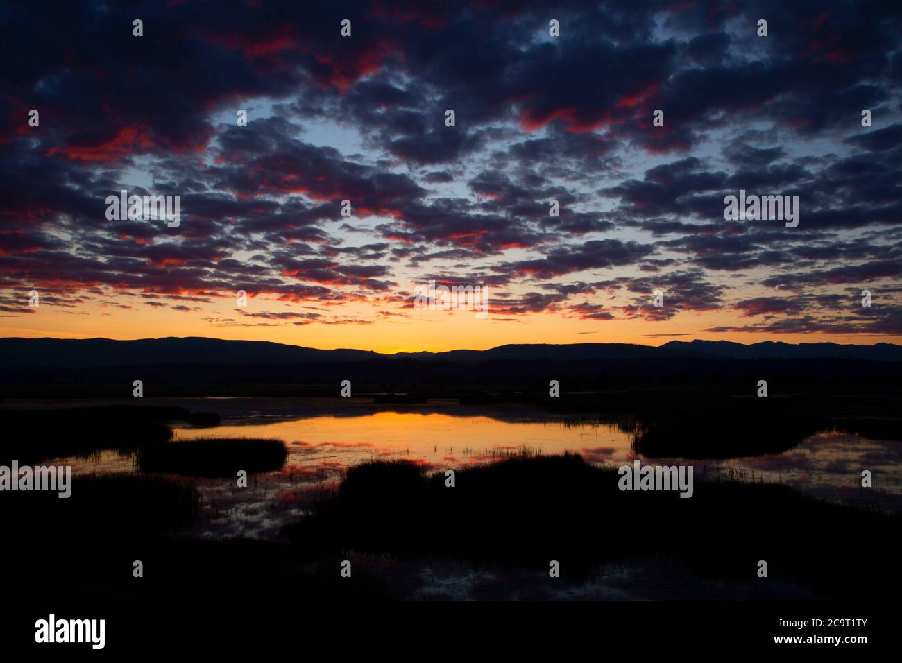 Myrtle Pond sunrise from tour road, Kootenai National Wildlife Refuge ...