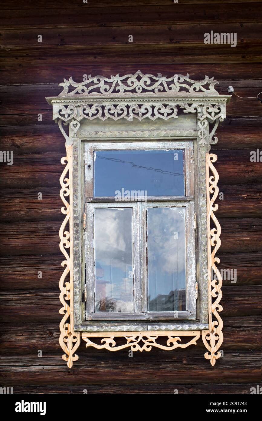 Russian windows with carved frames and shutters in village houses Stock ...
