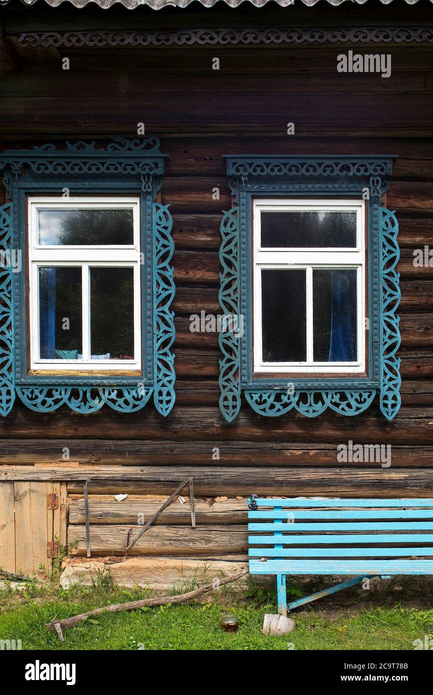 Russian windows with carved frames and shutters in village houses Stock ...