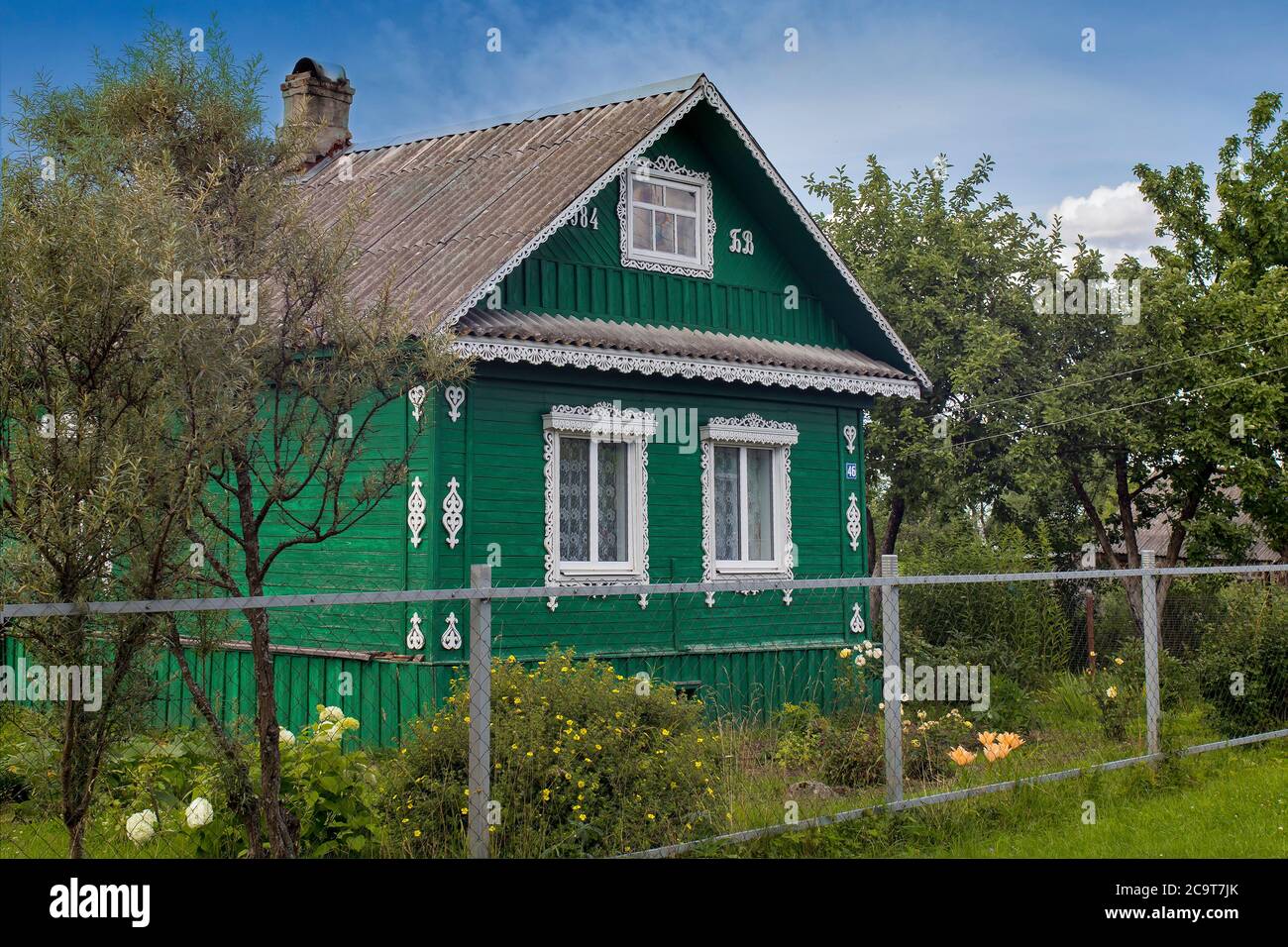 Russian rural landscape in summer, village houses on the river bank in ...