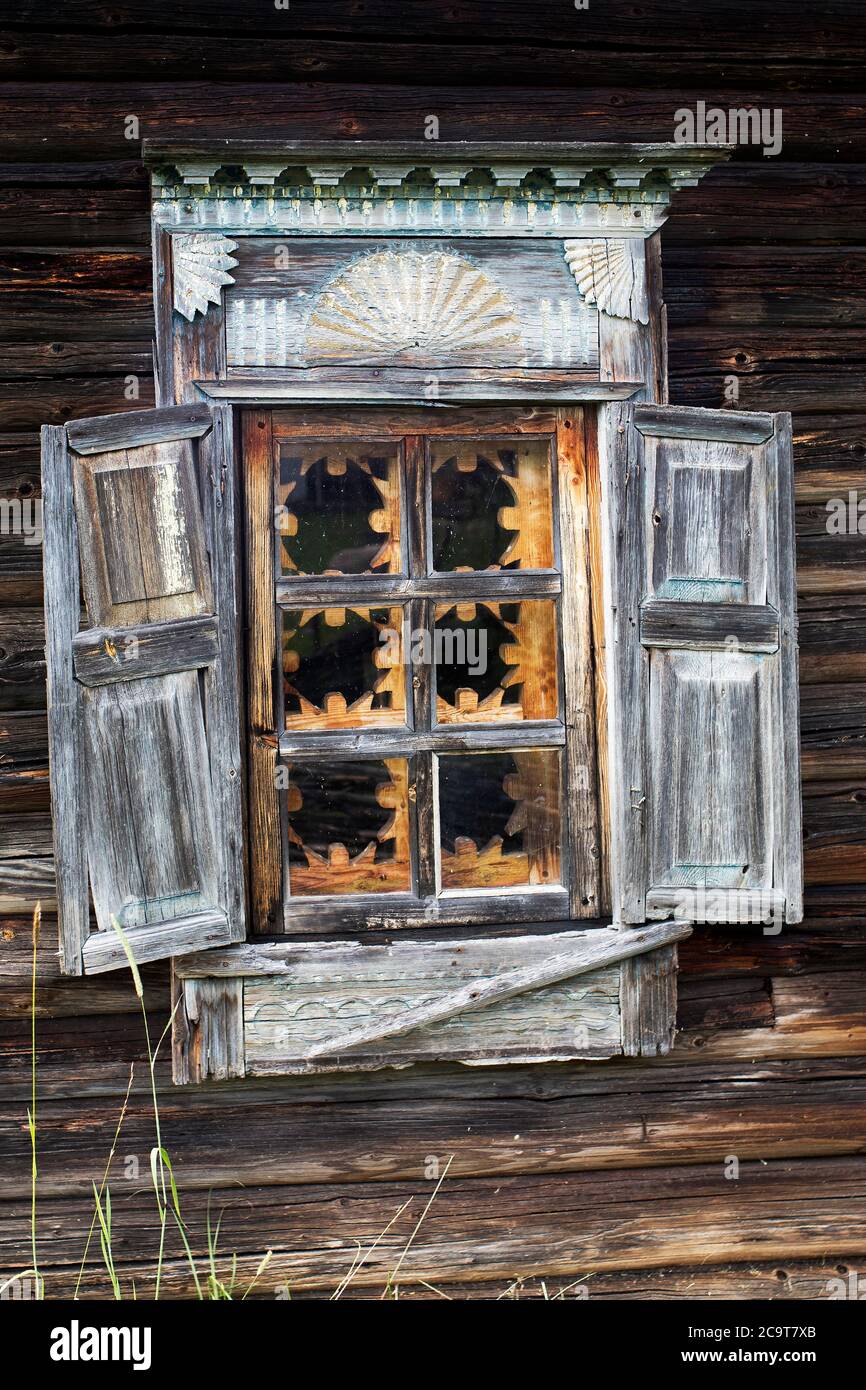 Russian windows with carved frames and shutters in village houses Stock ...