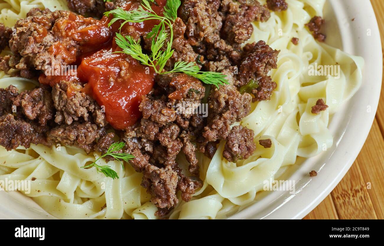 Rich ragu - Classic Italian beef ragu with shredded beef Stock Photo ...