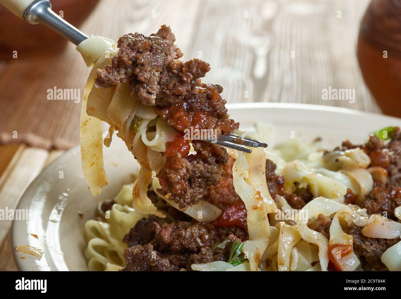 Rich ragu - Classic Italian beef ragu with shredded beef Stock Photo ...