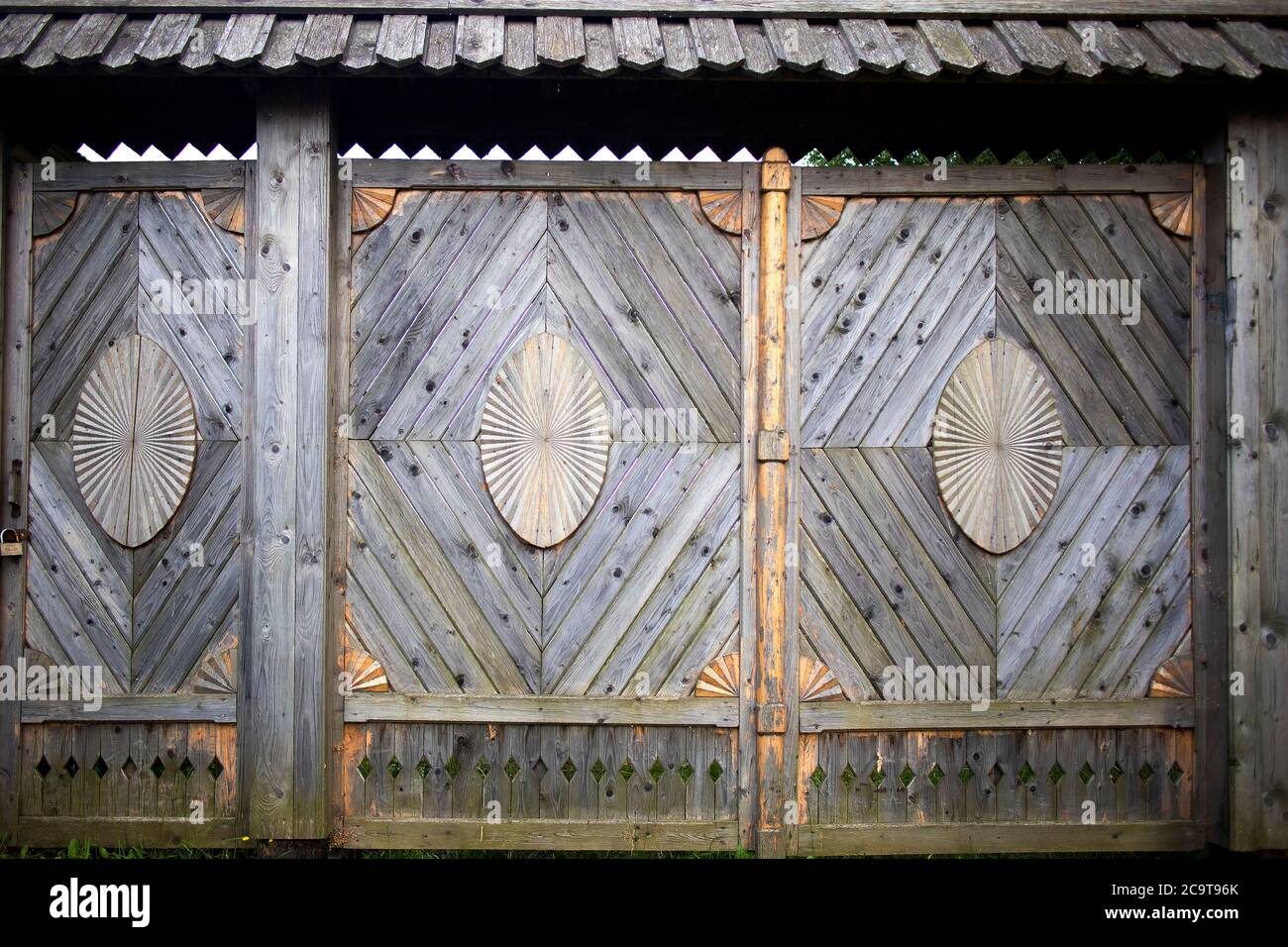 Carved gates on the city wooden manor in traditional style Stock Photo ...