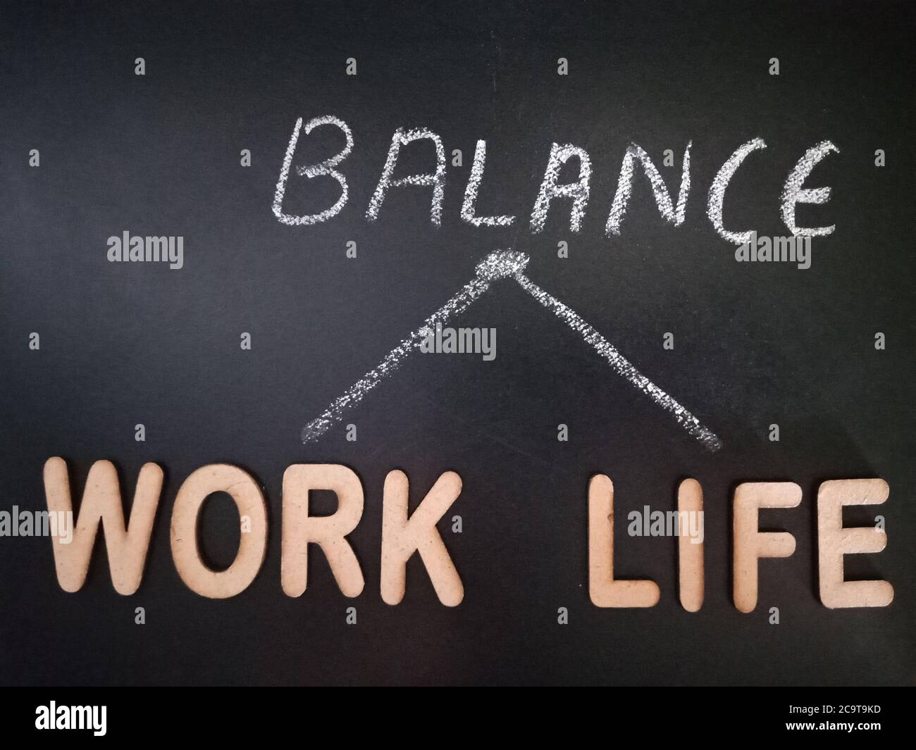 Work and life balance word presented on chalkboard concept for business ...