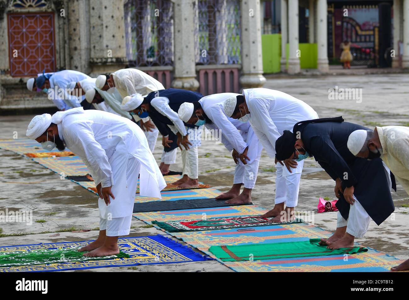 Muslim devotees at a Mosque during prayers. Maintaining social ...