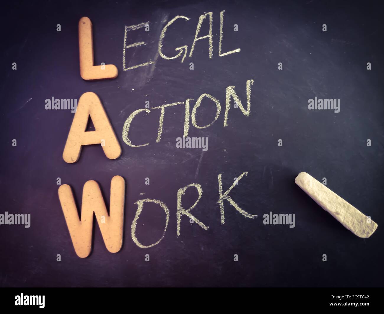 Legal action work word presented on chalk board with wooden text art ...