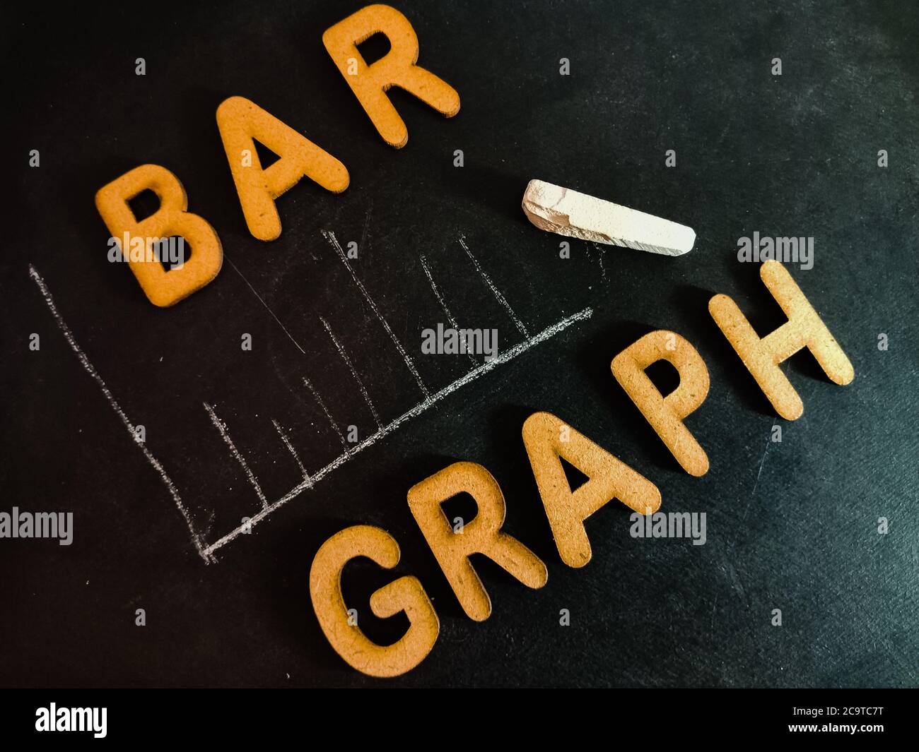Bar graph word presented on chalk board with wooden text art texture at ...