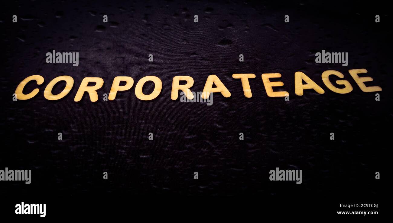 Corporate word presented on black board with wooden text art texture at ...