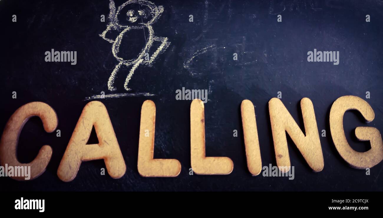 Calling mobile cartoon concept word presented on black board with ...
