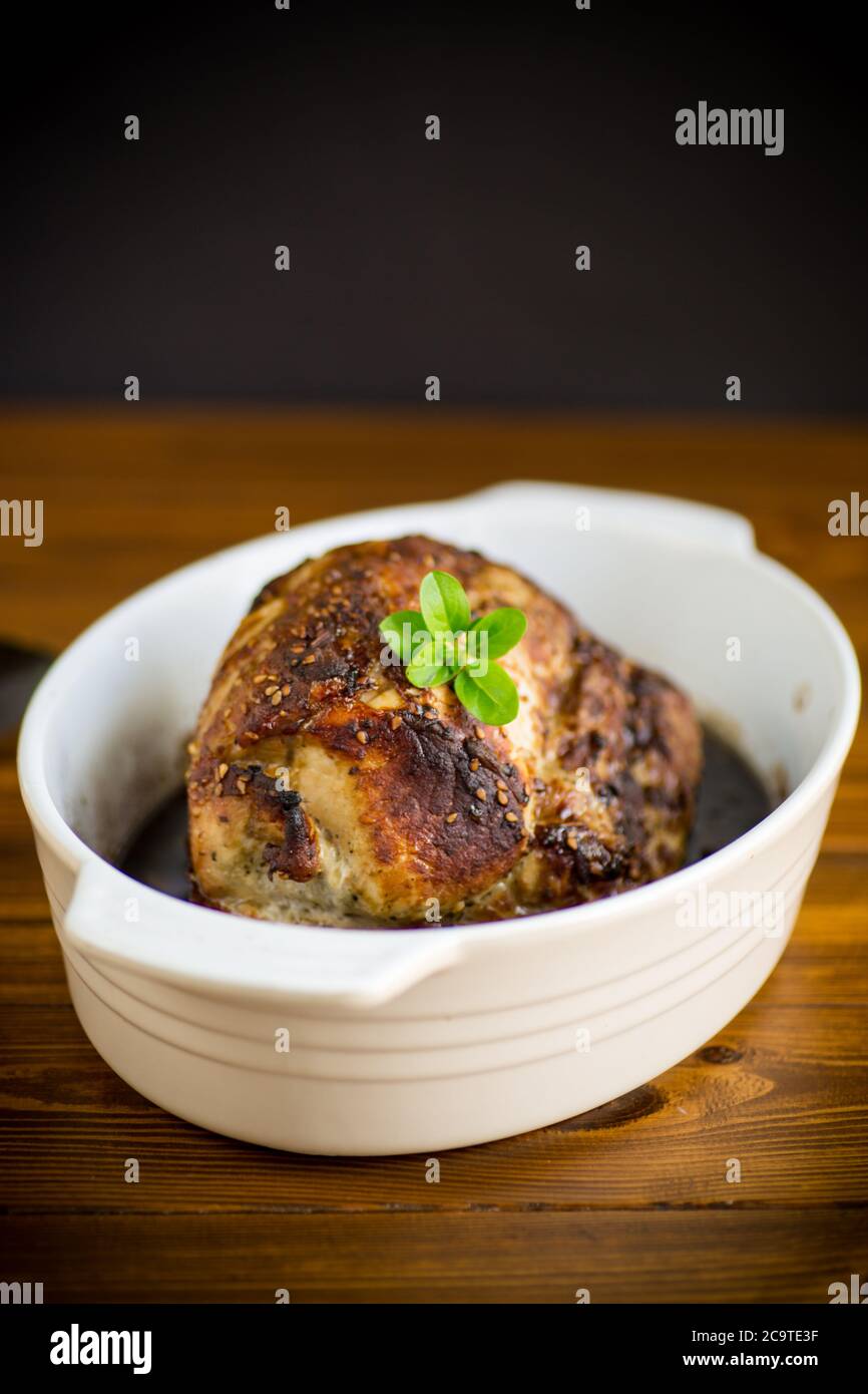 juicy pork neck, baked meat with spices in a ceramic mold Stock Photo ...