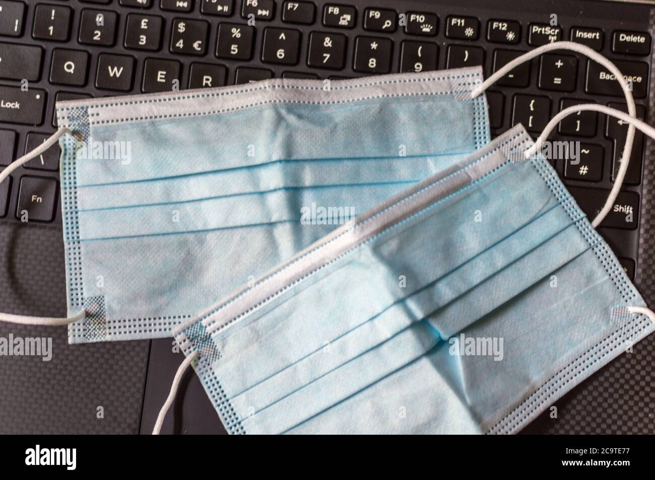 Laptop keyboard and mask hi-res stock photography and images - Alamy