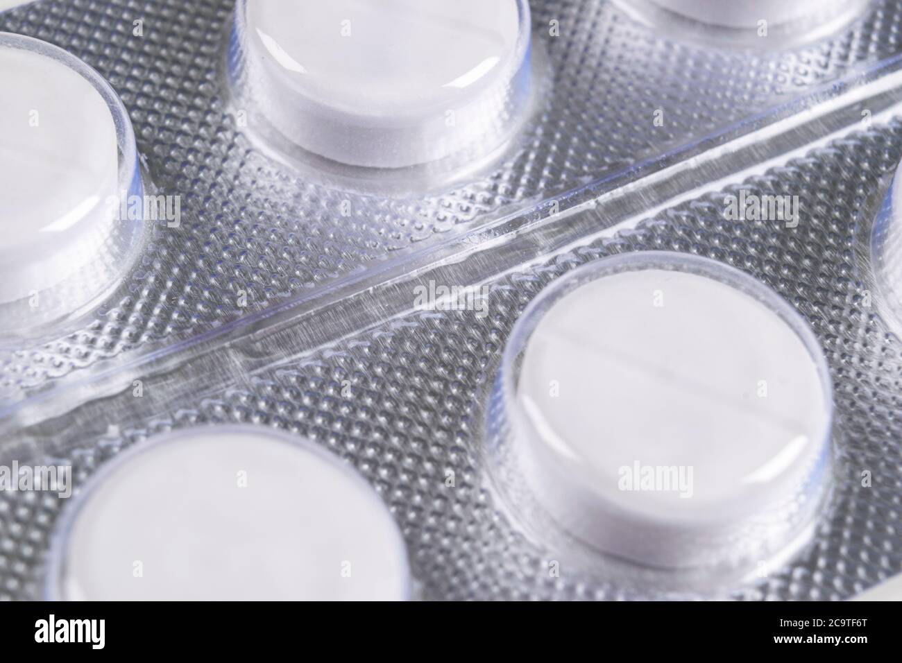 Macro shot pile of tablets pill in blister packaging. Silver aluminium ...