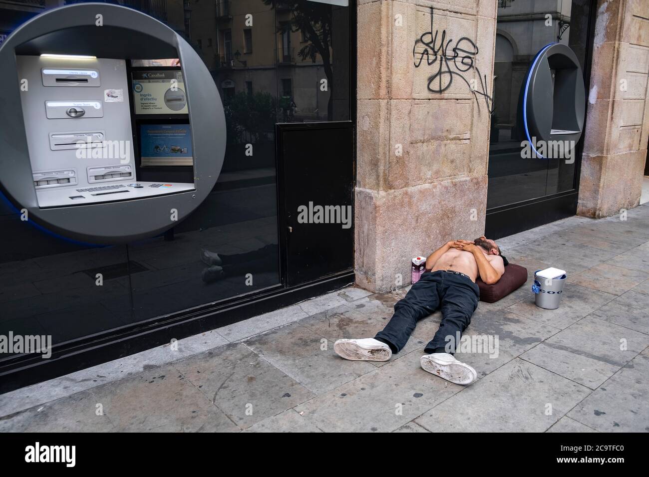 Homeless man sleeping bank hi-res stock photography and images - Alamy