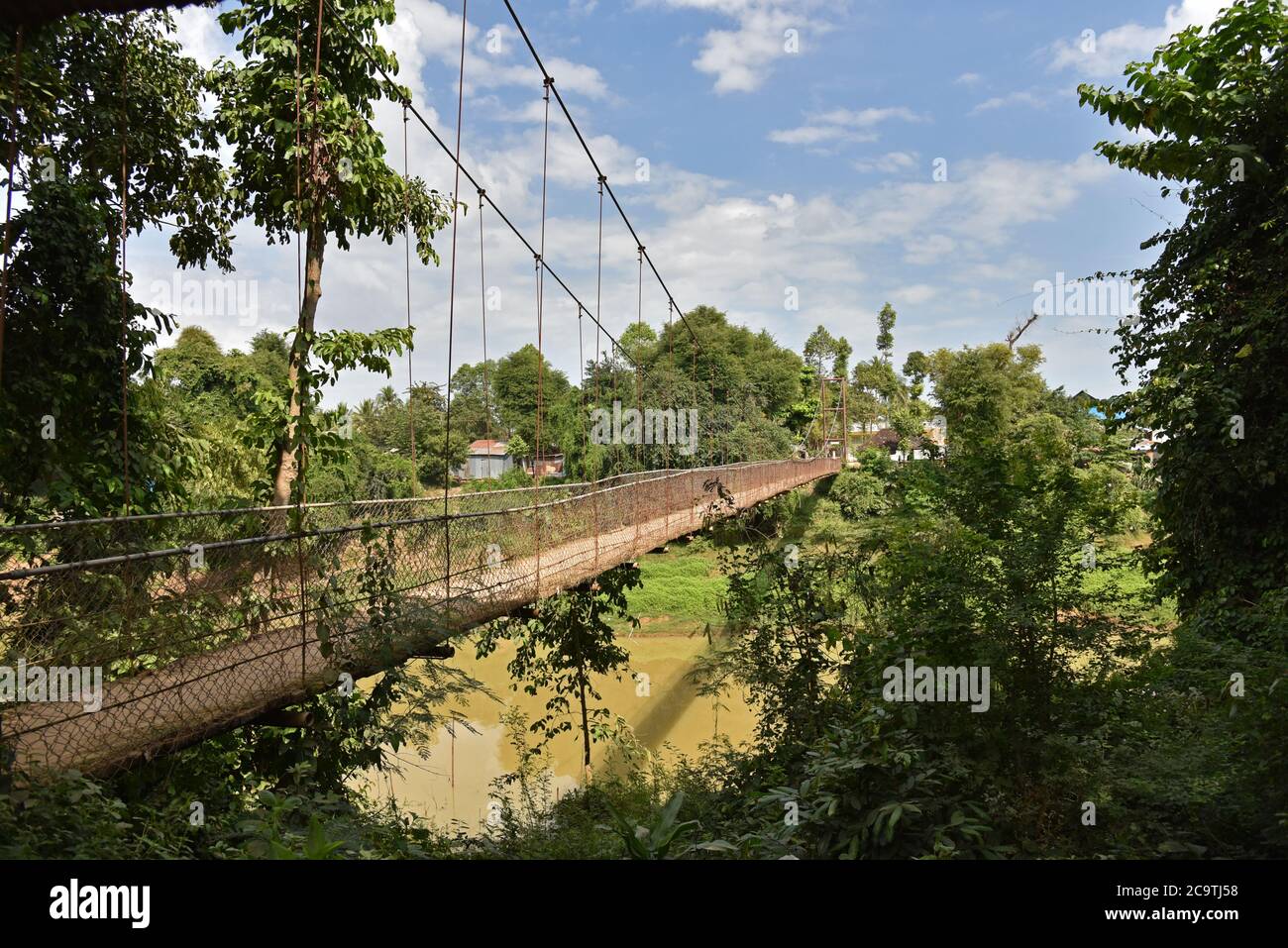 Wooden and wire hanging bridge in Battambang, which the locals call the ...