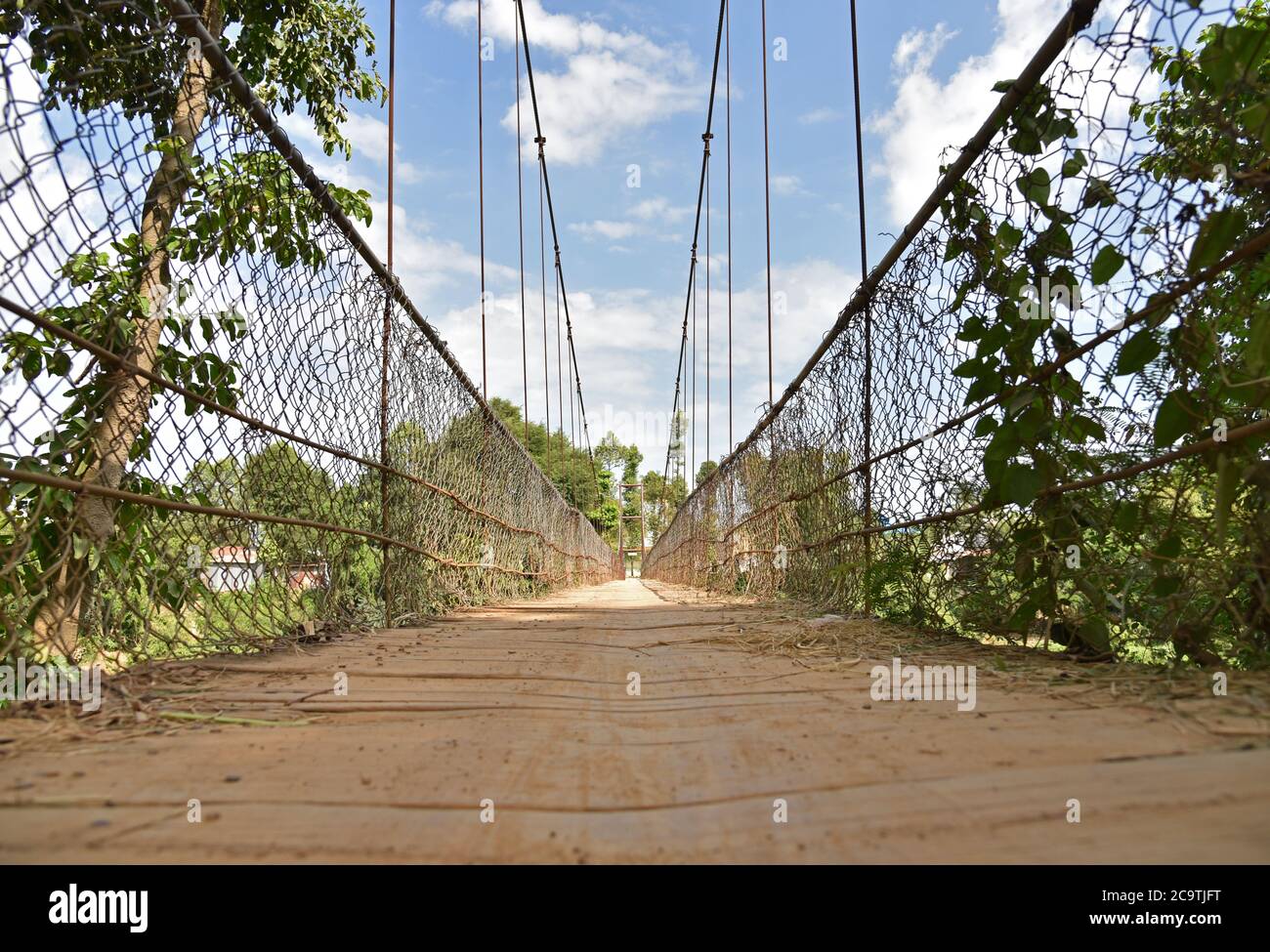 Wooden and wire hanging bridge in Battambang, which the locals call the ...