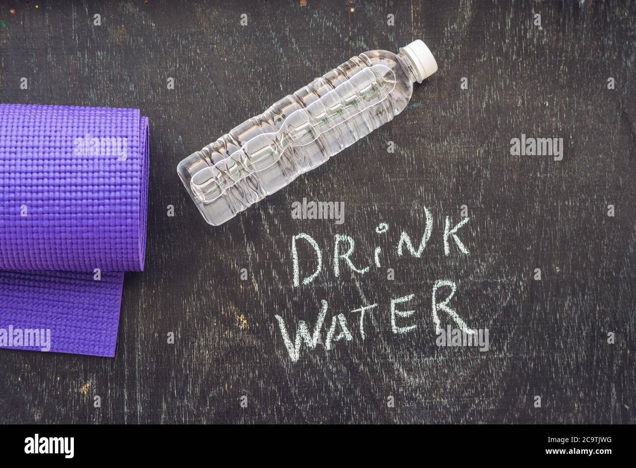 drink more water - hydration reminder - handwriting on On a chalk board ...