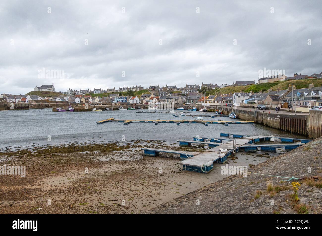 Tide tidal pier safe haven pots lost lobster moor moored hi-res stock ...