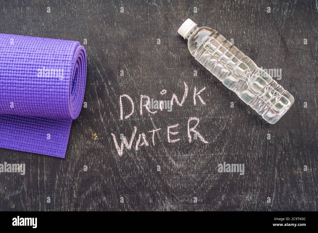 drink more water - hydration reminder - handwriting on On a chalk board ...