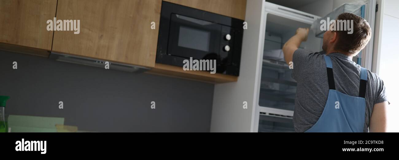 Opened door of freezer Stock Photo - Alamy