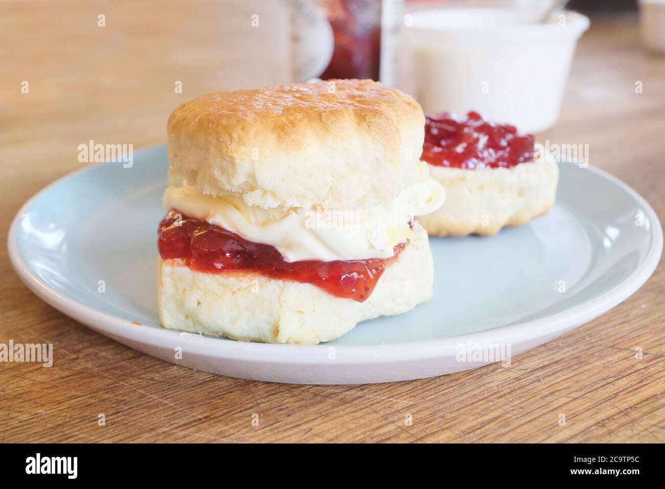 afternoon tea british tea and scones with jam and cream Stock Photo - Alamy