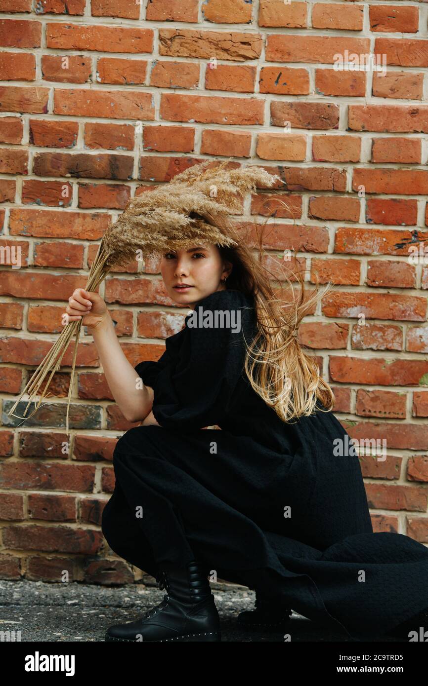 Lady in long boots hi-res stock photography and images - Alamy