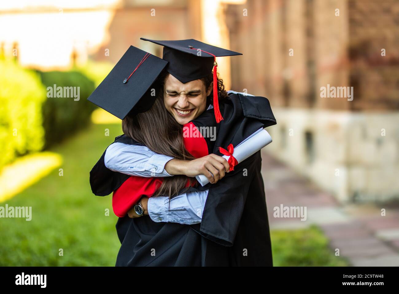 Graduation hug parent hi-res stock photography and images - Alamy