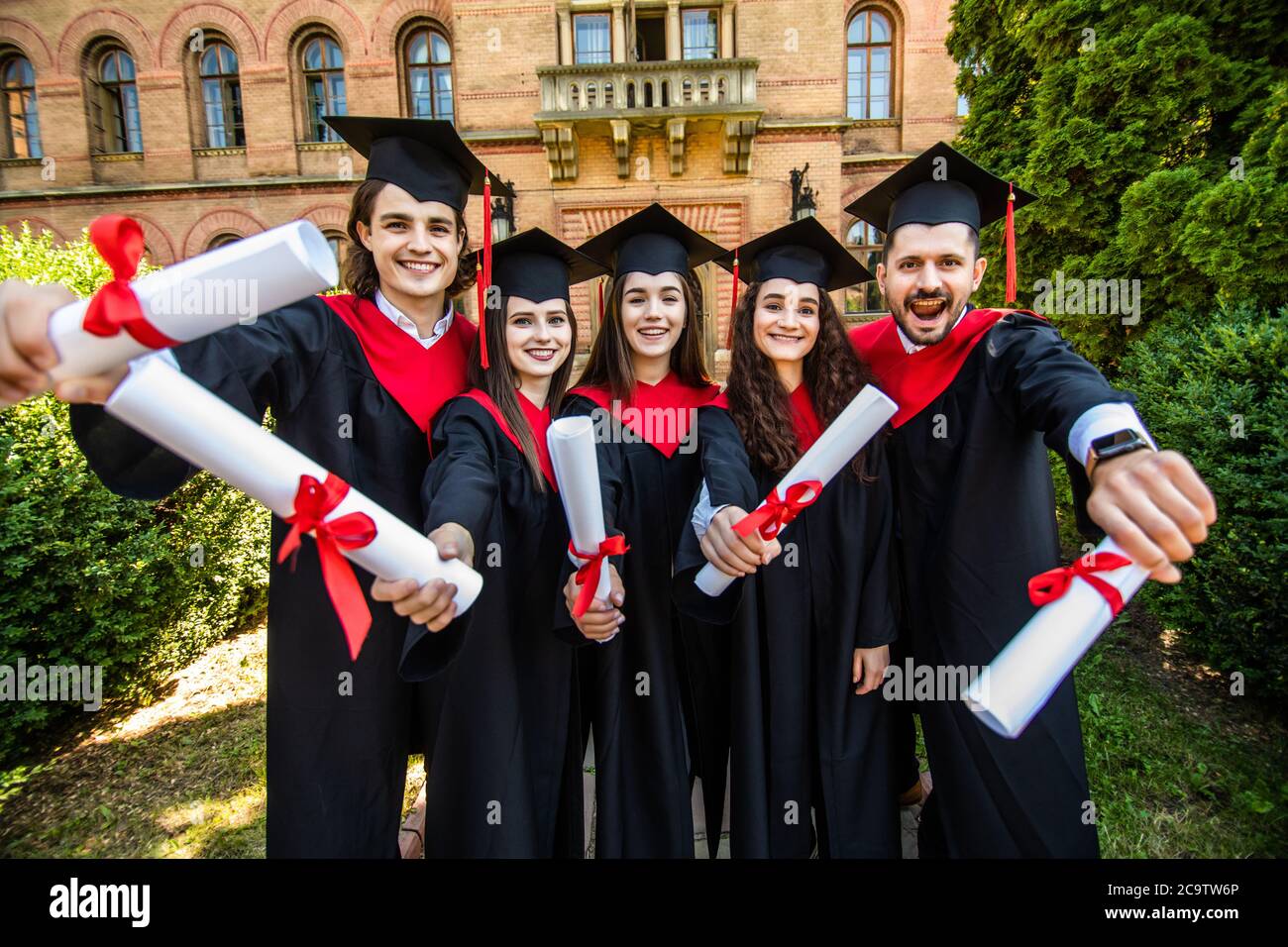 College graduates diplomas hi-res stock photography and images - Alamy