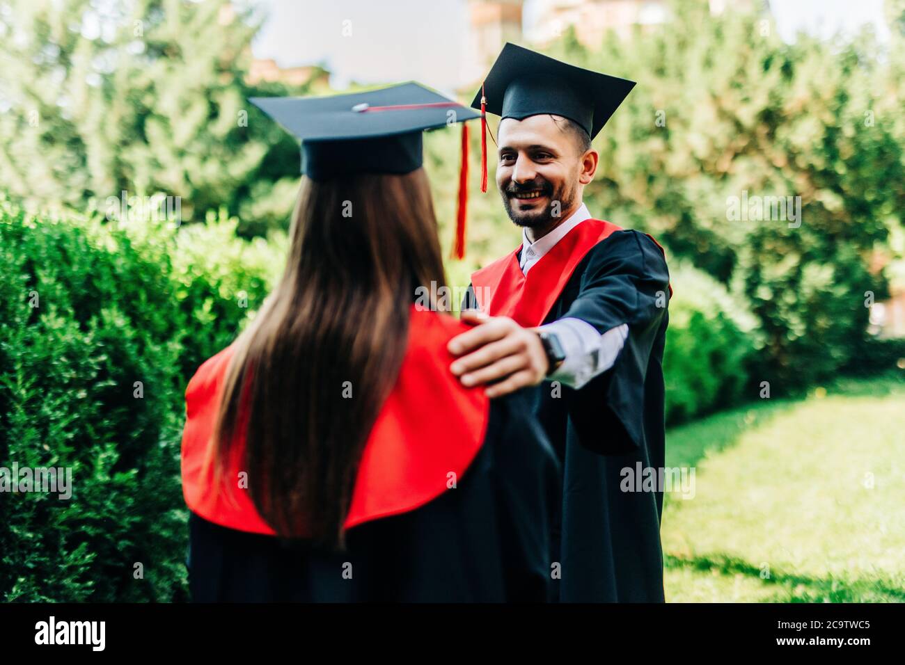 Beautiful graduate girl and boy enjoyed the ceremony graduation Stock ...