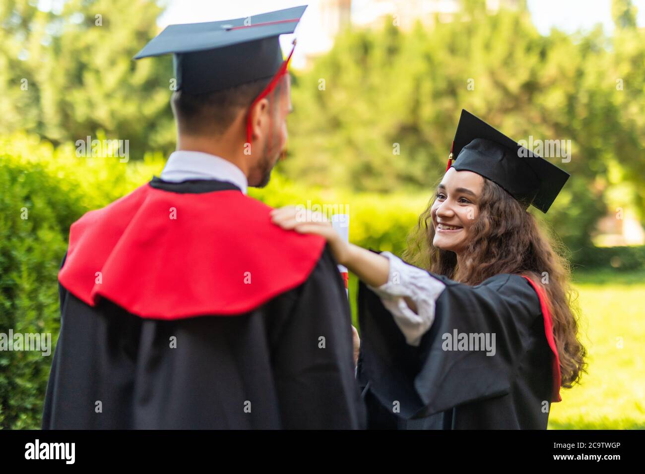 Beautiful graduate girl and boy enjoyed the ceremony graduation Stock ...