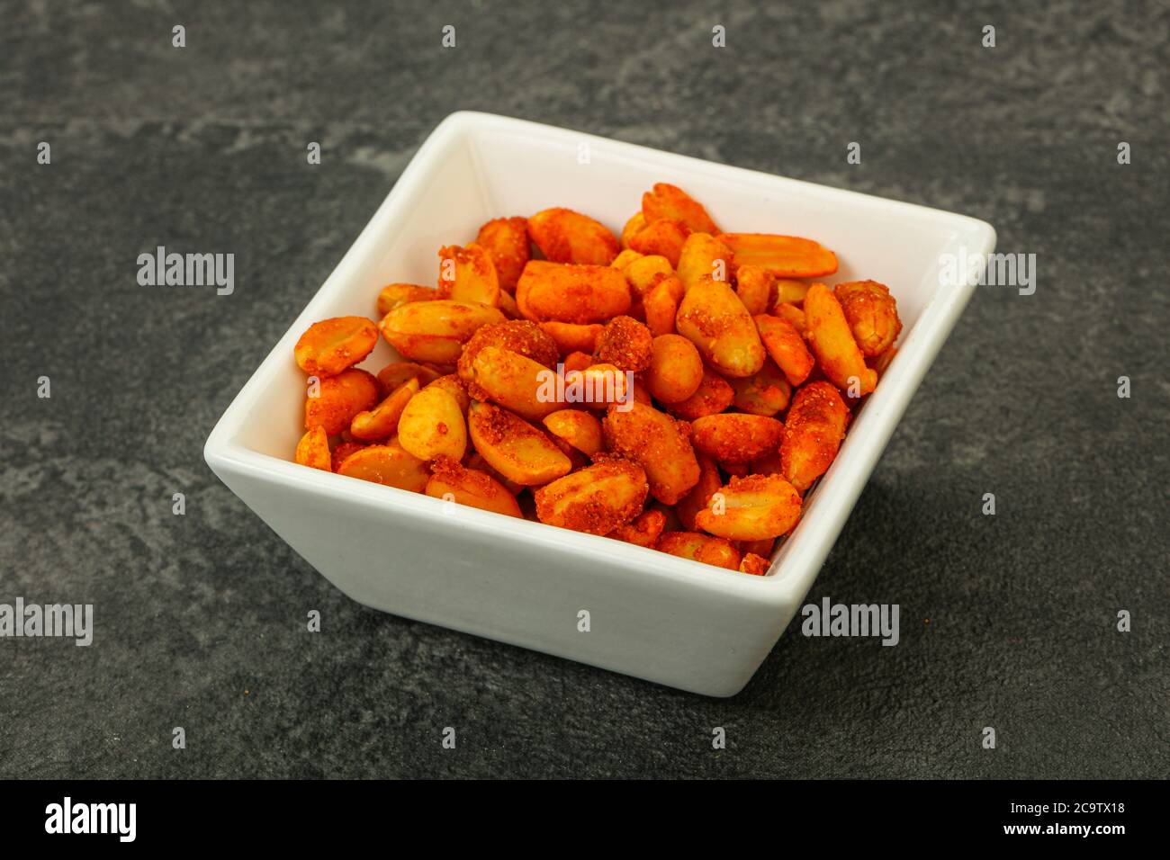 Chilli coated peanuts hi-res stock photography and images - Alamy