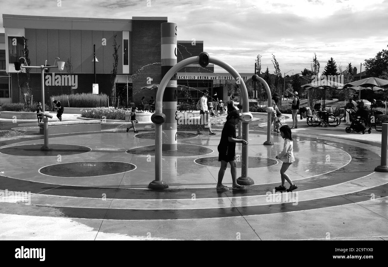 Children Playing Splash Pad High Resolution Stock Photography and ...