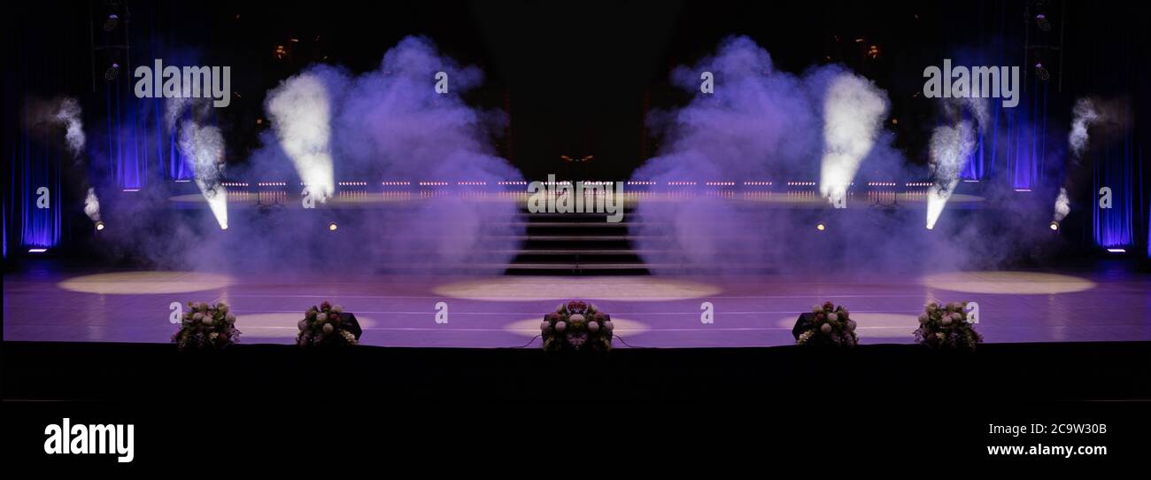 Theater stage with puffs of smoke, illuminated by stage light Stock ...