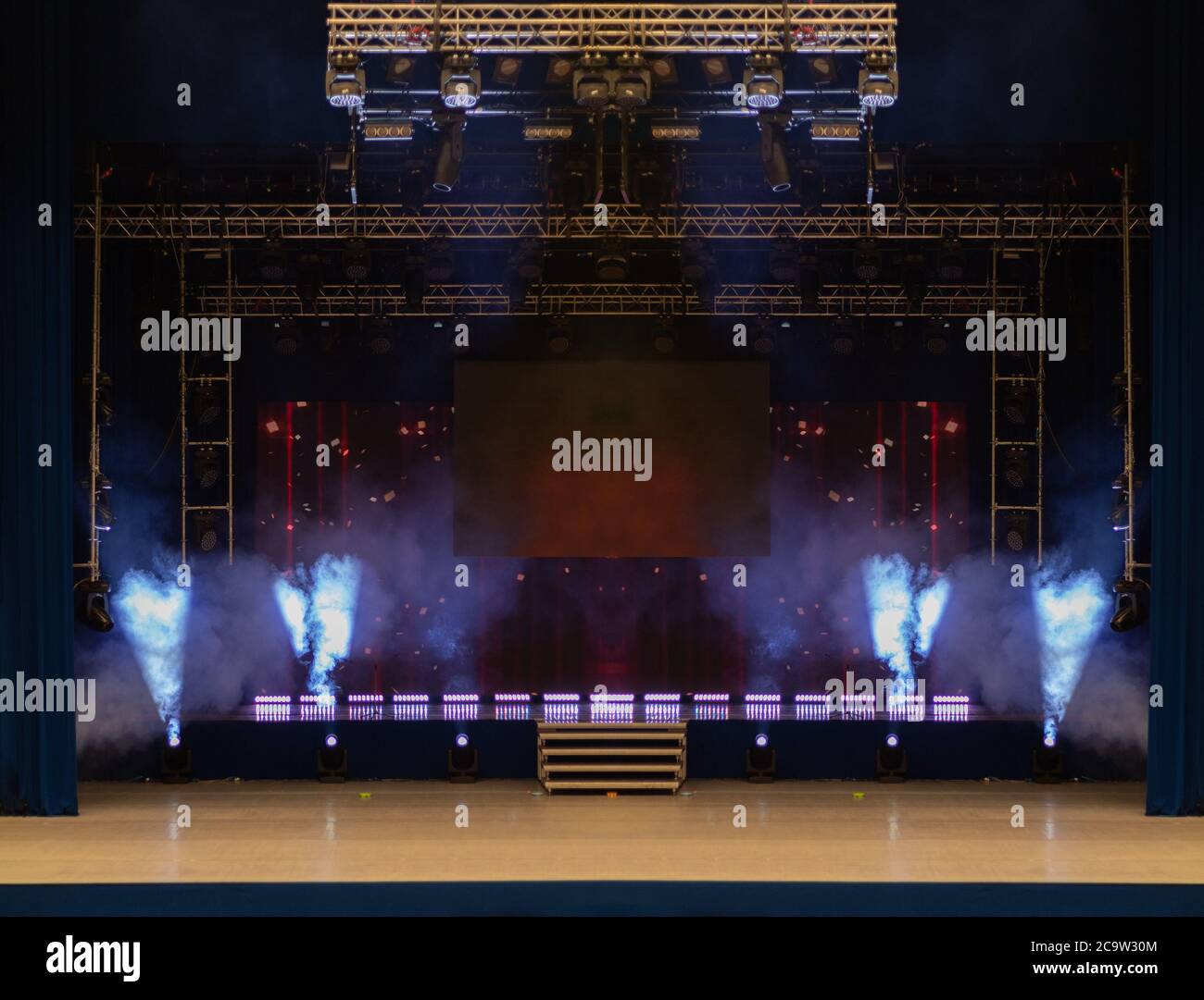 Theater stage with puffs of smoke, illuminated by stage light Stock ...