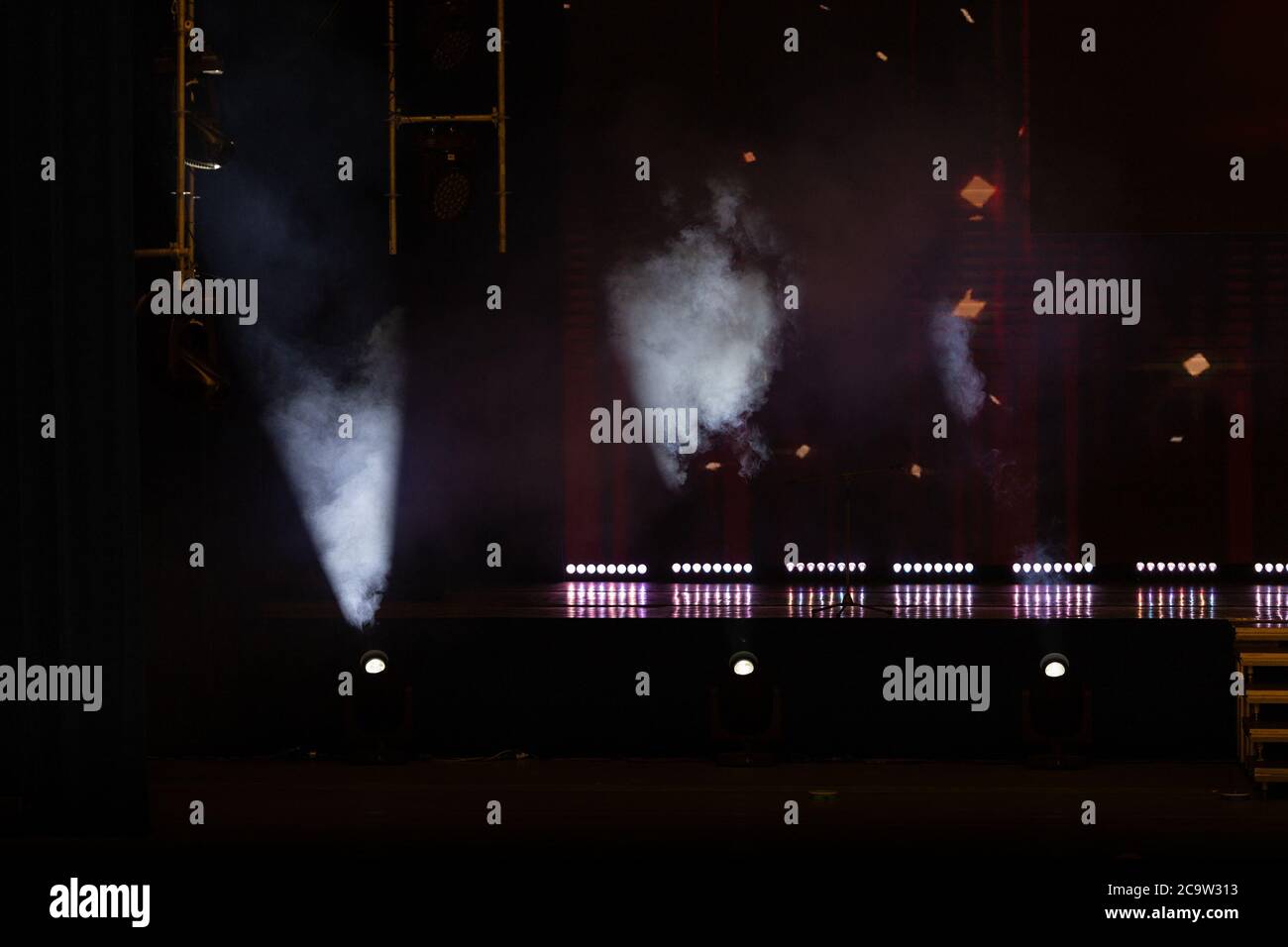 Theater stage with puffs of smoke, illuminated by stage light Stock ...