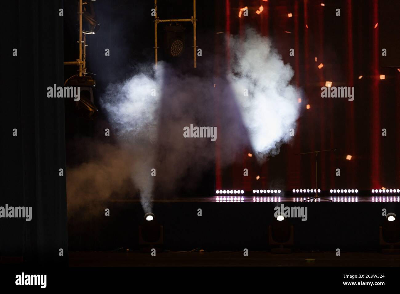 Theater stage with puffs of smoke, illuminated by stage light Stock ...