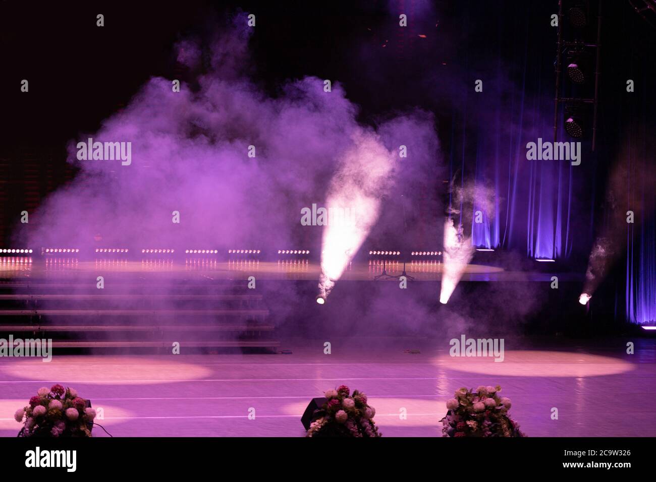 Theater stage with puffs of smoke, illuminated by stage light Stock ...