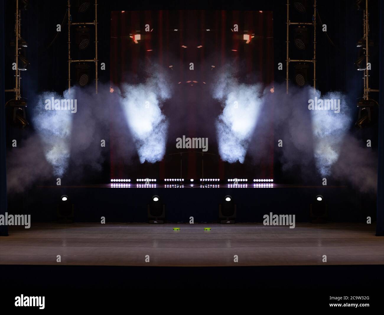 Theater stage with puffs of smoke, illuminated by stage light Stock ...
