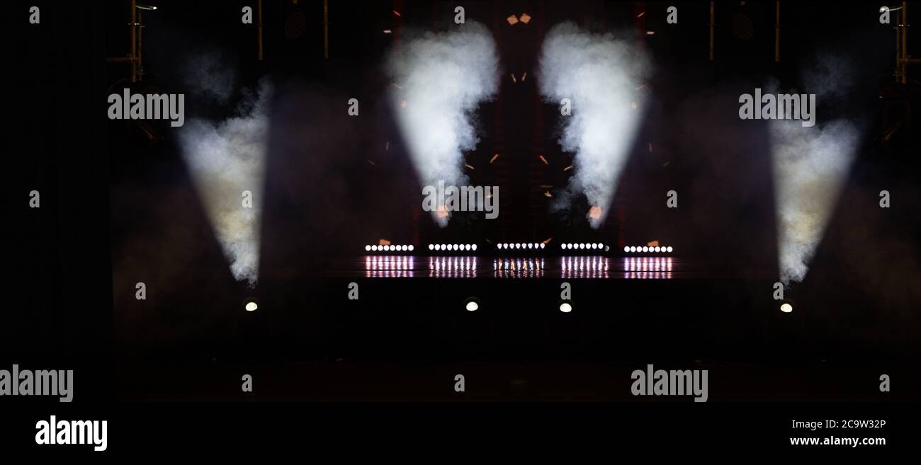 Theater stage with puffs of smoke, illuminated by stage light Stock ...