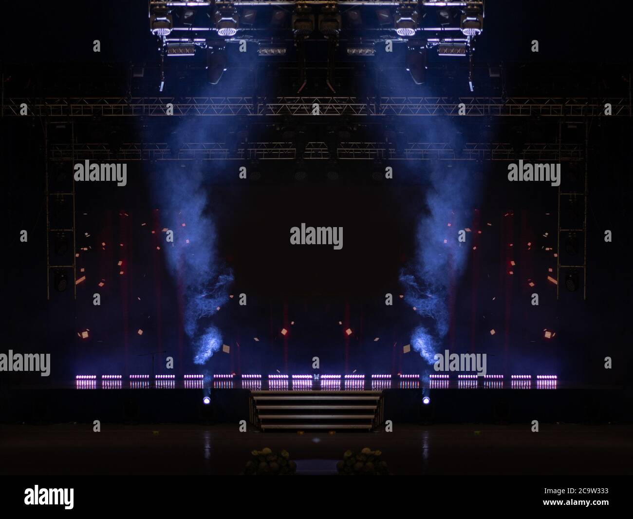 Lighting and spotlights, stage light and smoke in the theater above the ...