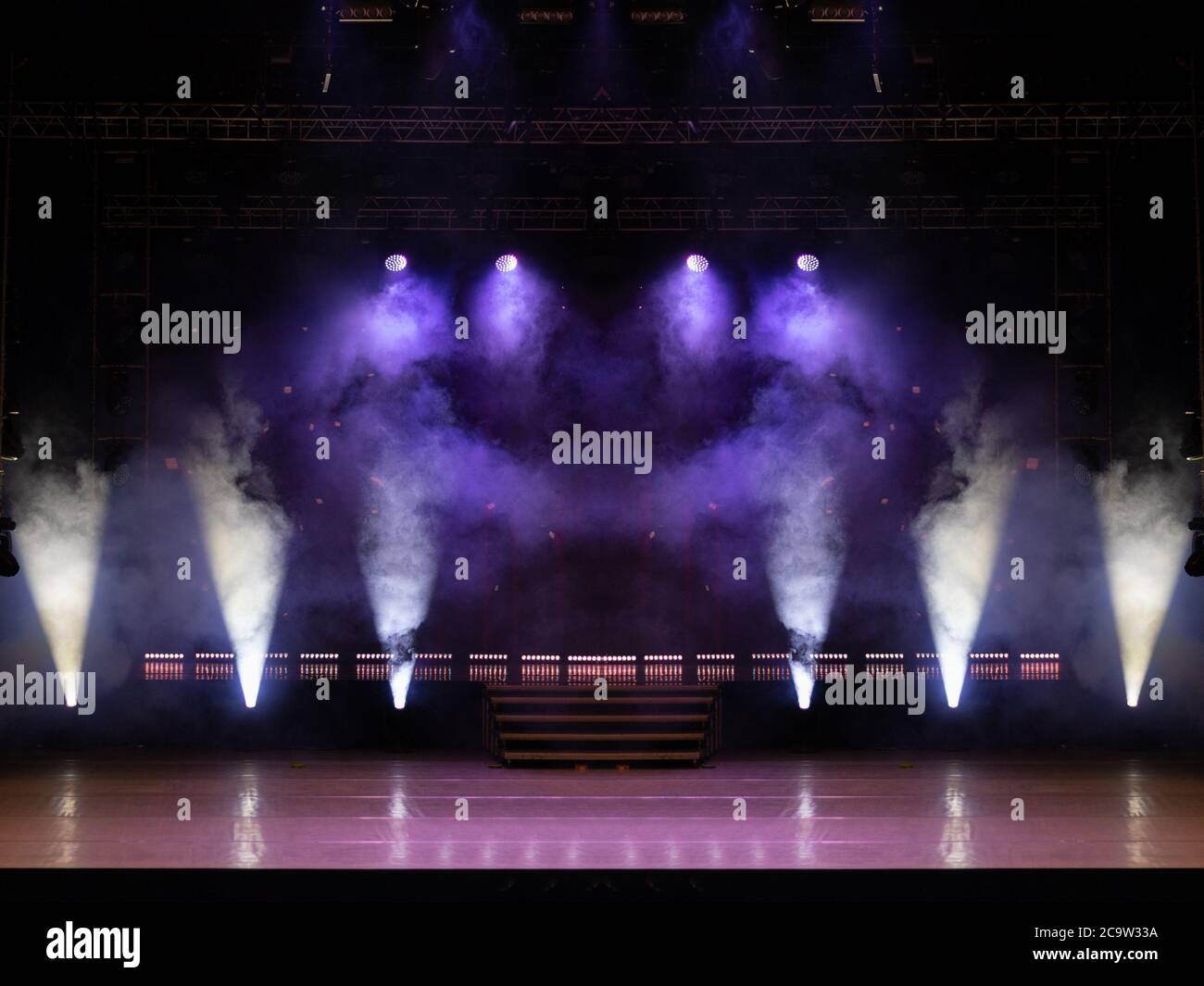 Theater stage with puffs of smoke, illuminated by stage light Stock ...