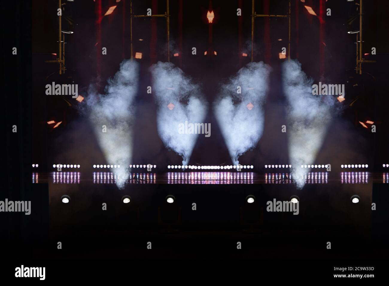 Theater stage with puffs of smoke, illuminated by stage light Stock ...