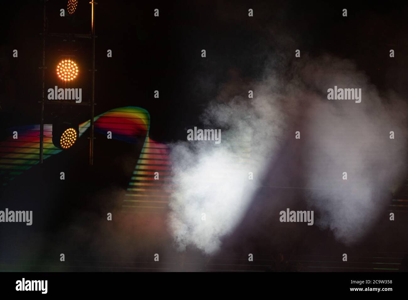 Theater stage with puffs of smoke, illuminated by stage light Stock ...
