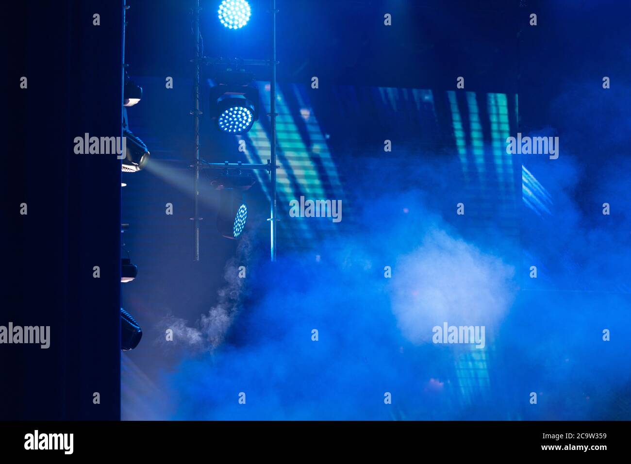 Theater stage with puffs of smoke, illuminated by stage light Stock ...