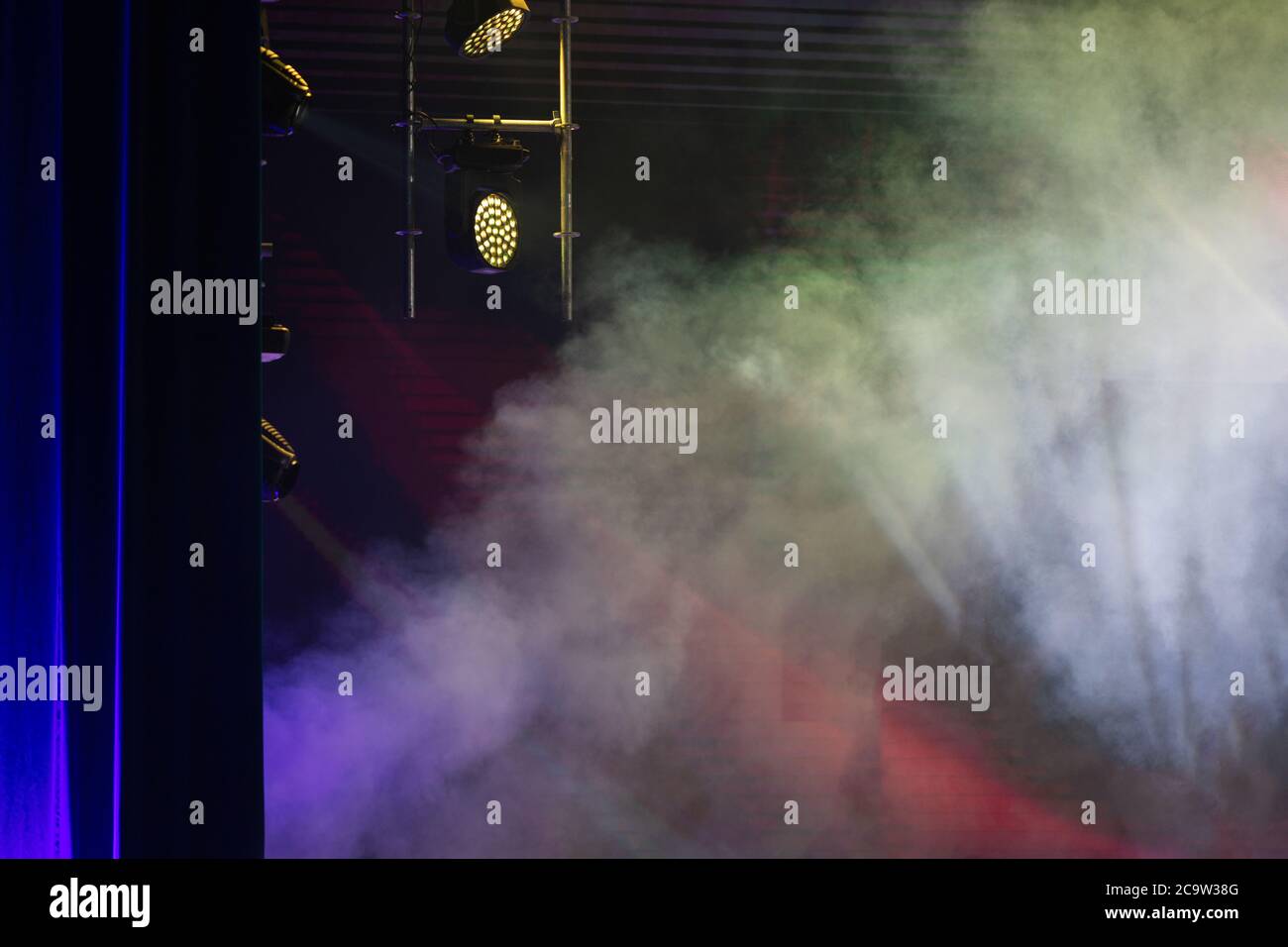 Theater stage with puffs of smoke, illuminated by stage light Stock ...