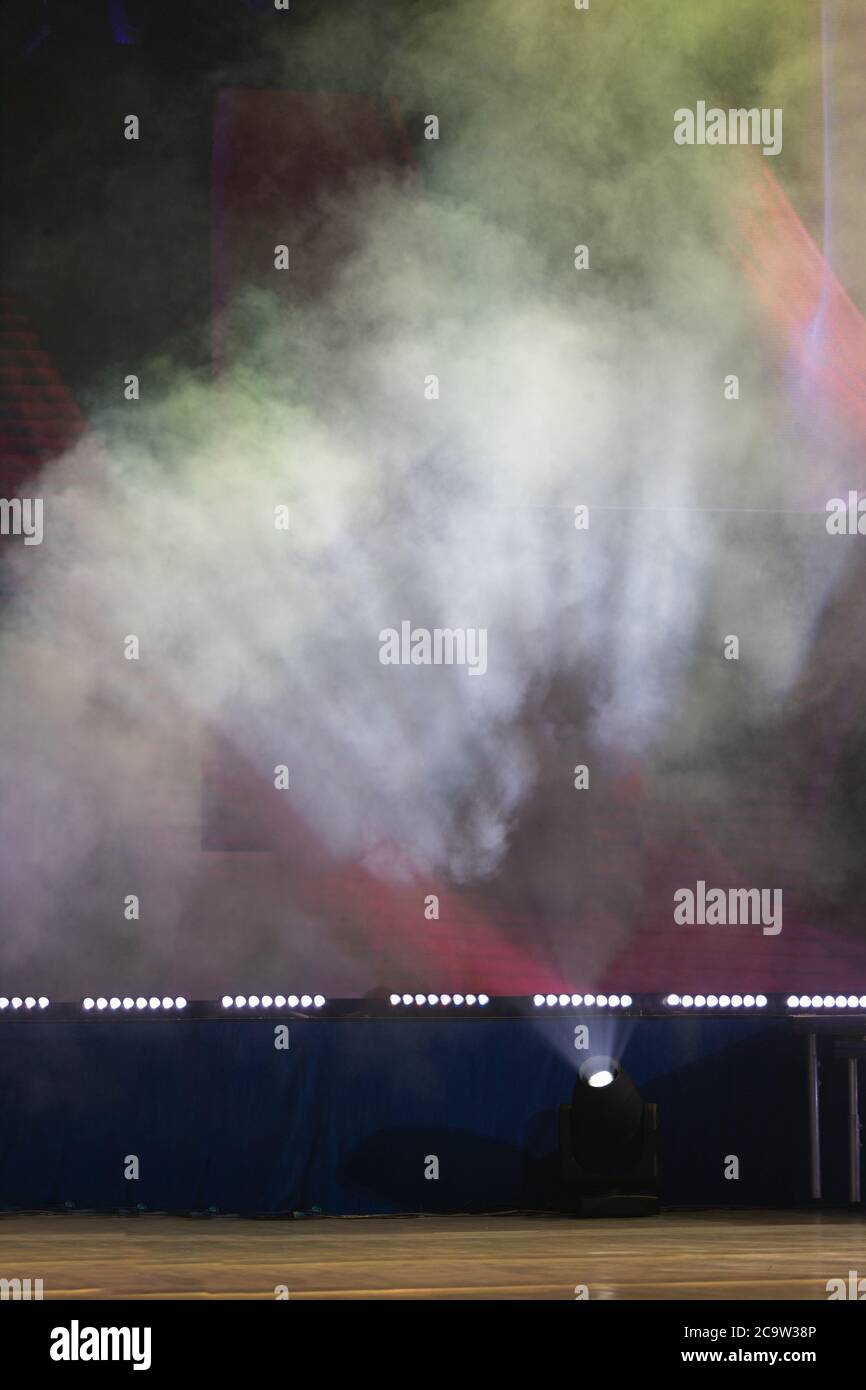 Theater stage with puffs of smoke, illuminated by stage light Stock ...