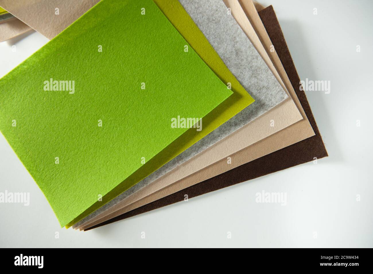 lots of different fabrics on a white background. Set of multi-colored ...