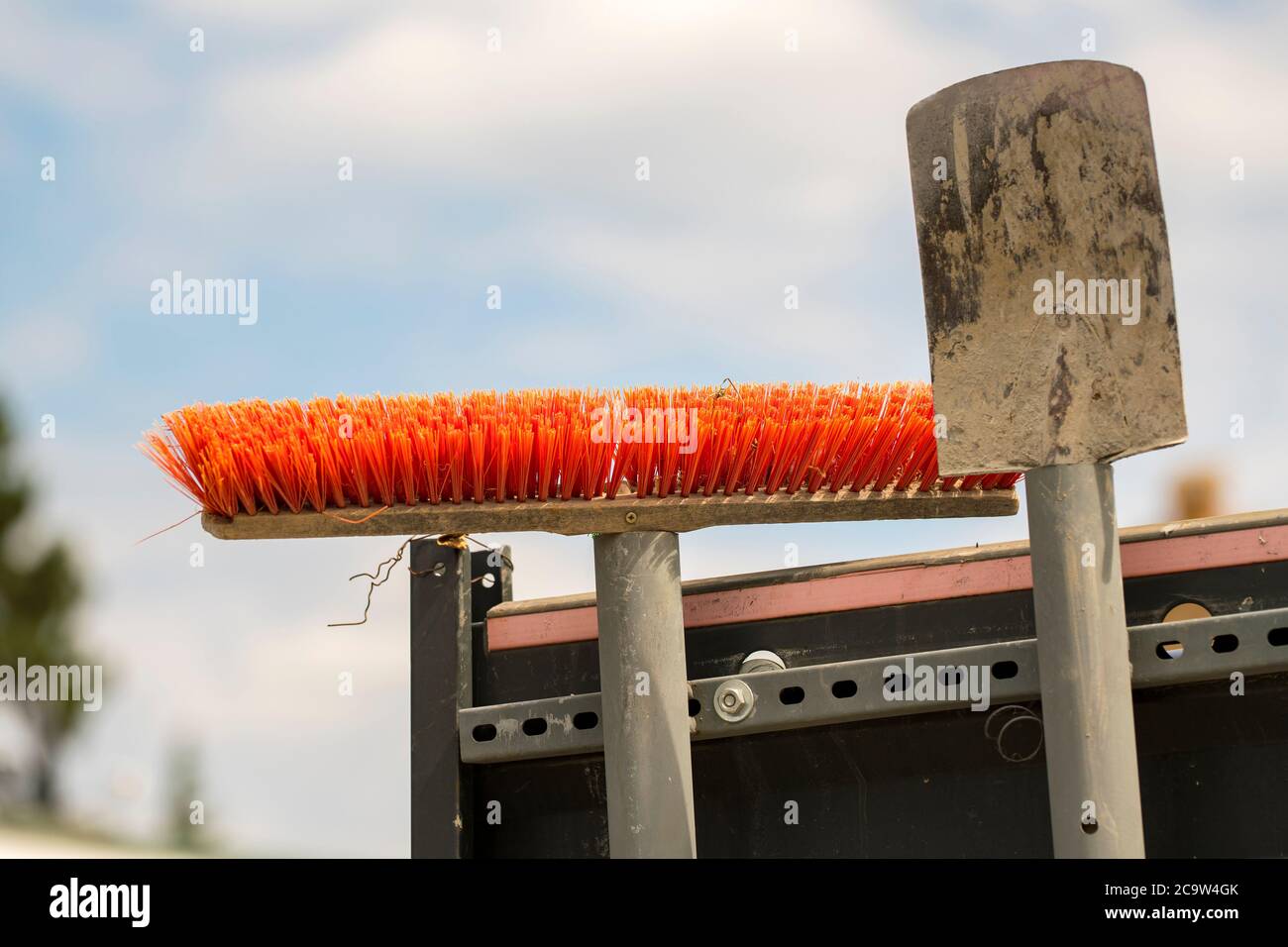 Tool road worker with broom, shovel and spade Stock Photo - Alamy